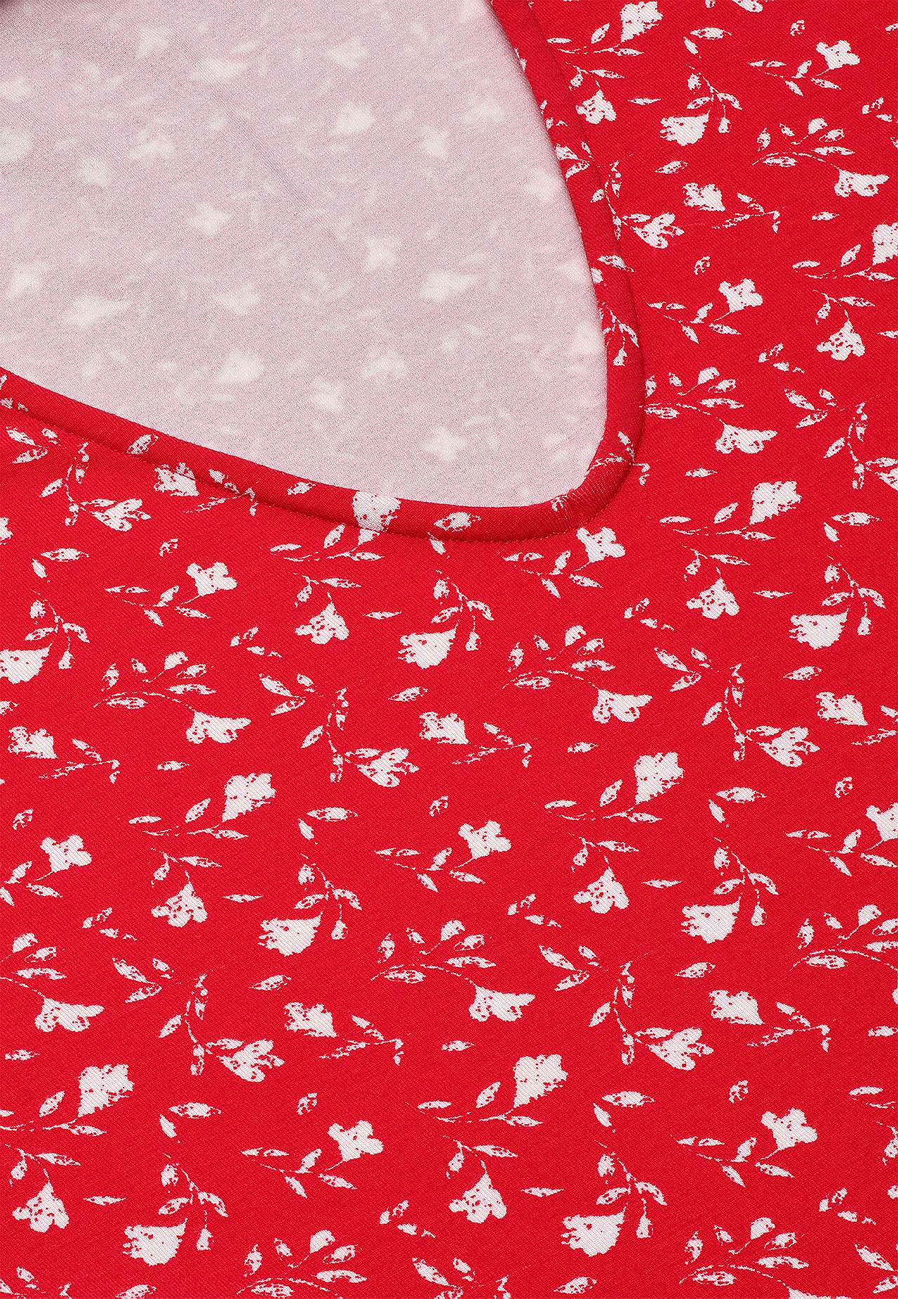 Jerseykjole med et blomstermønster og lommer | Cellbes